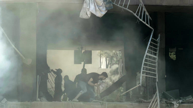 Israel says it struck Hezbollah targets in Beirut after cross-border fire