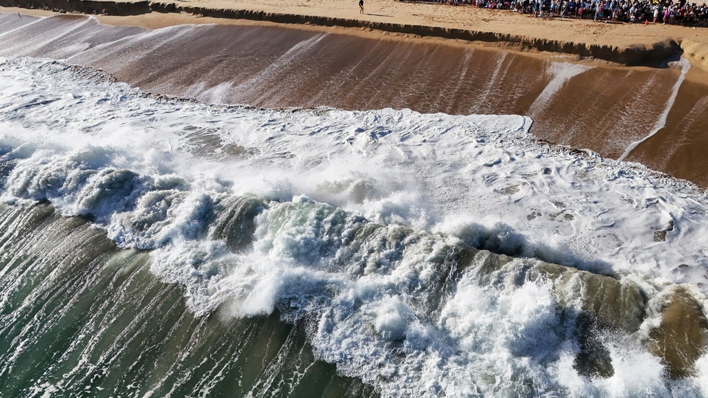 Beach city residents prepare as king tides and strong surf batter ...
