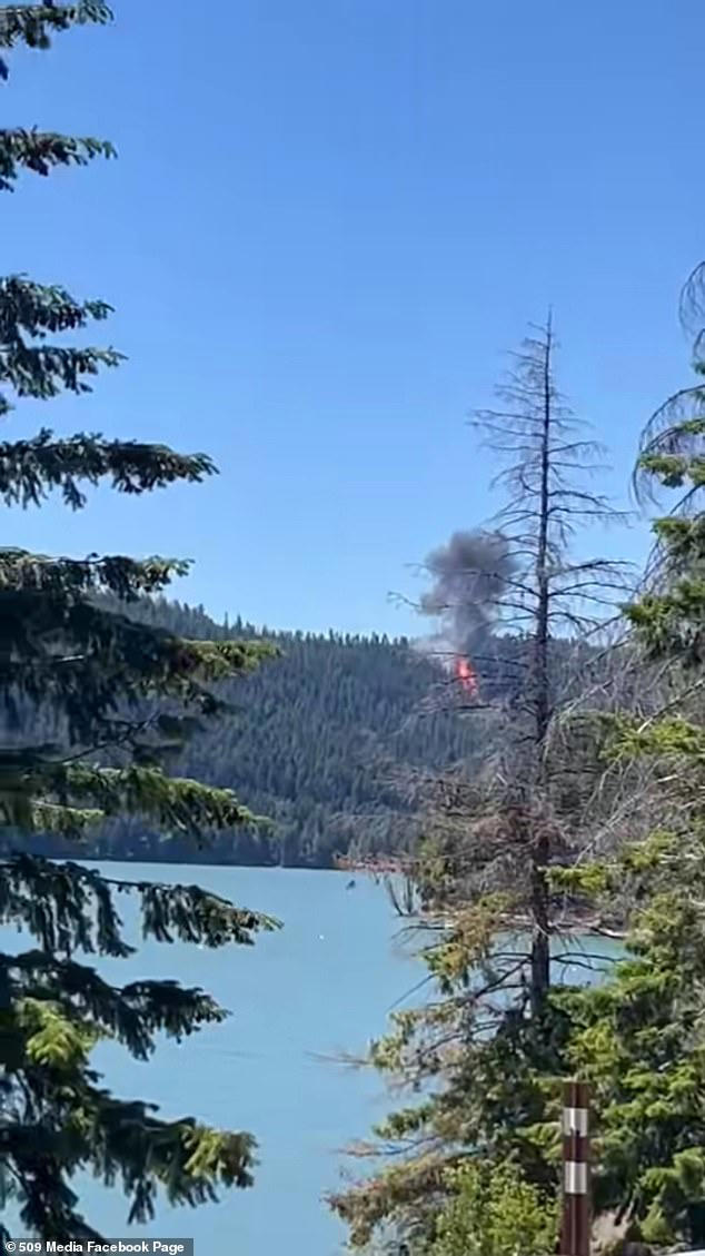Navy fighter jet crashes near lake sparking fireball and sending thick ...