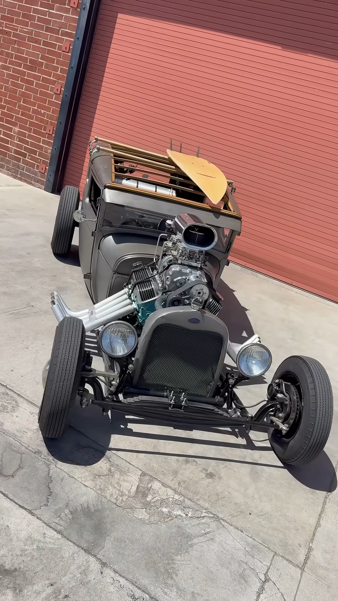Unique vintage hot rod build with surfboard