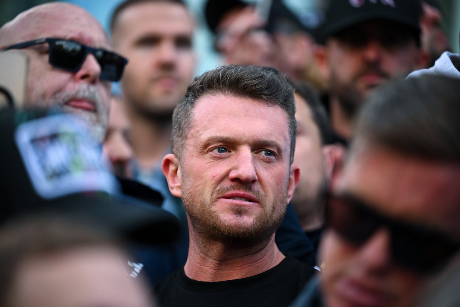 Tommy Robinson detained at Heathrow and begs supporters for money