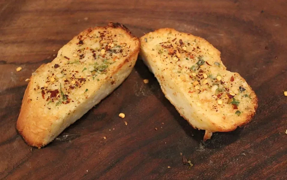 Emeril Lagasse’s garlic bread upgrade worth trying