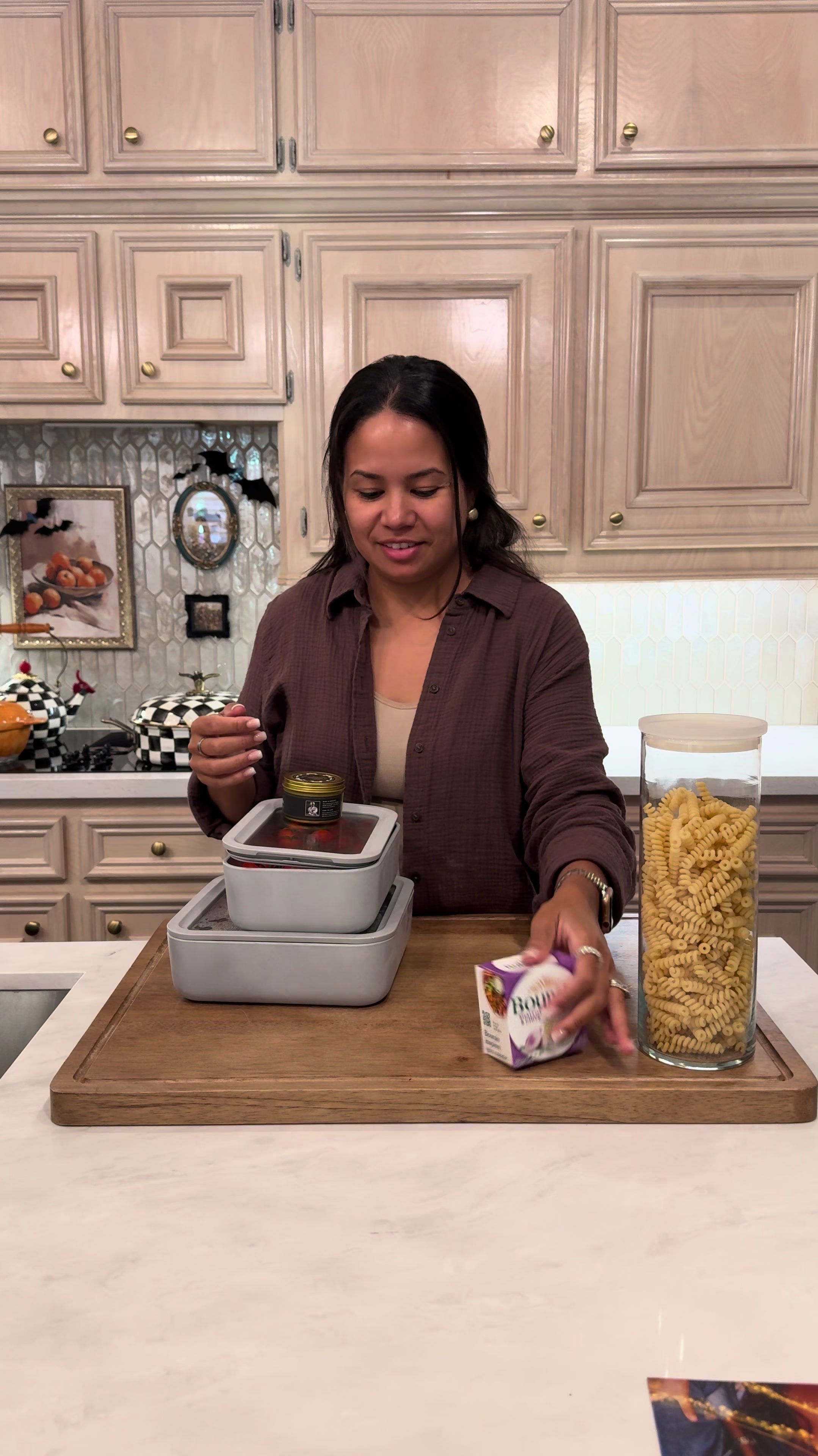 Making the simple viral Boursin pasta with chicken sausage and tomatoes ...