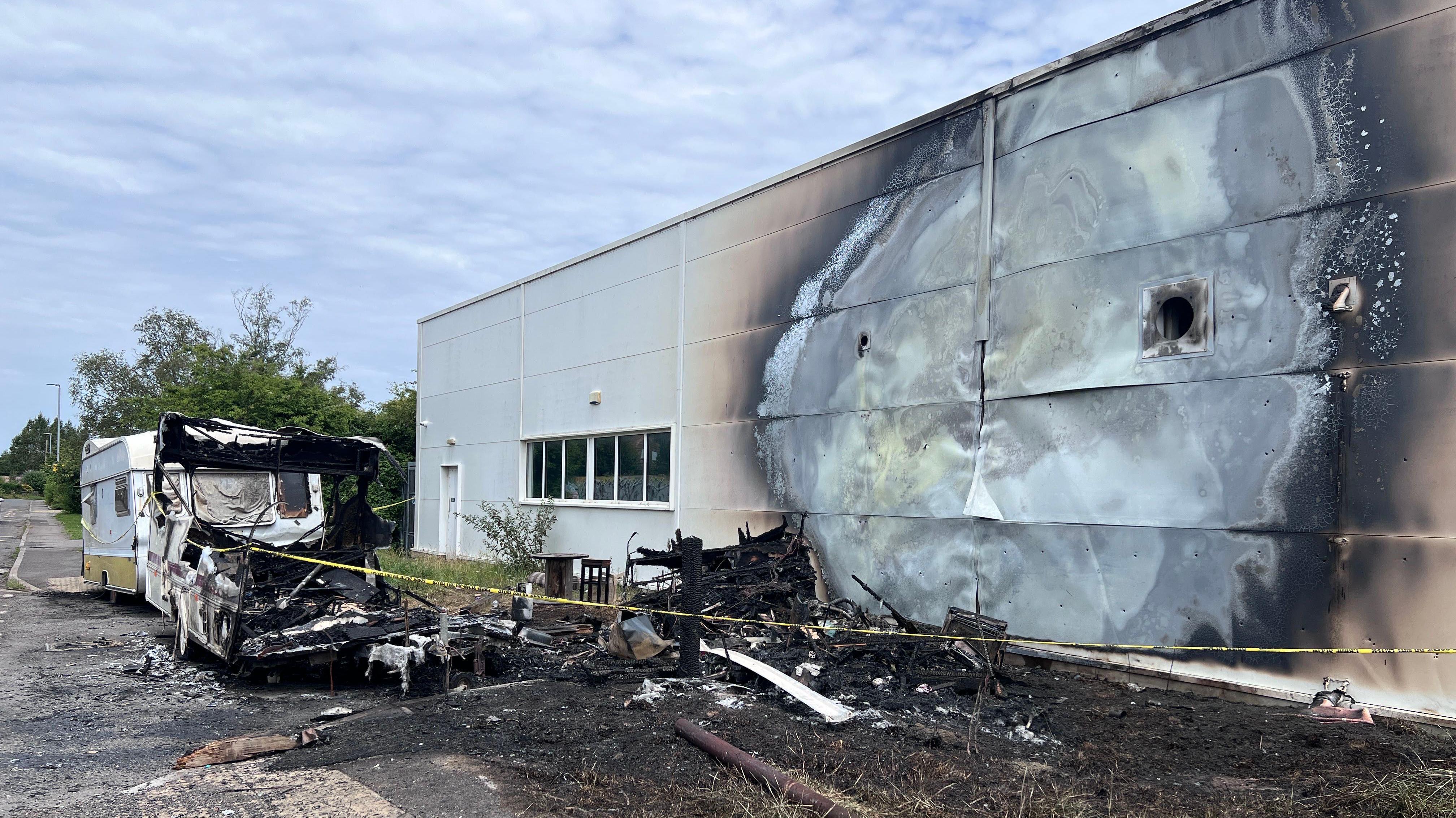 Arson arrests after 'deliberate' caravan fire