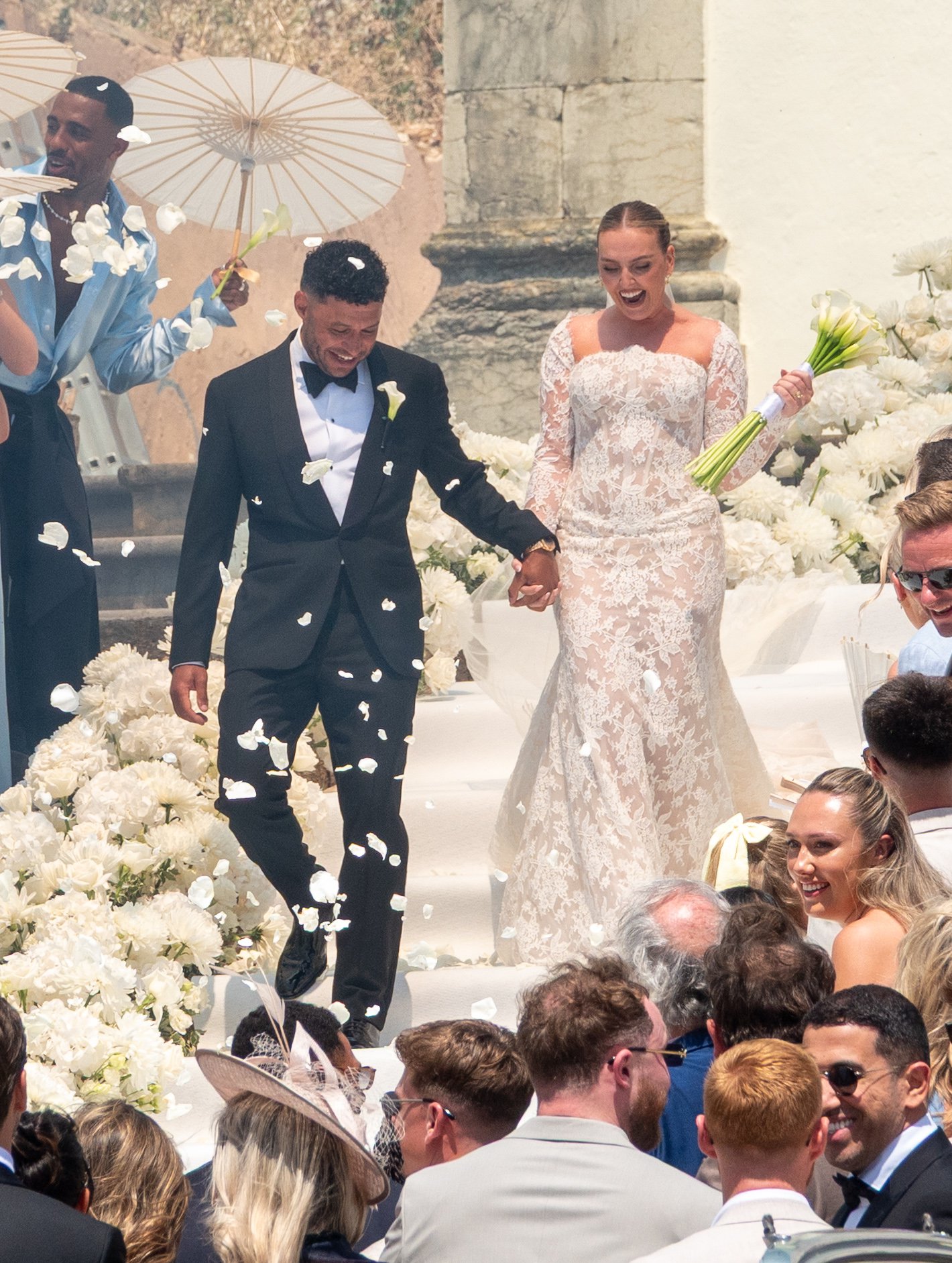 Perrie Edwards glows in lace wedding gown as she marries Alex Oxlade ...