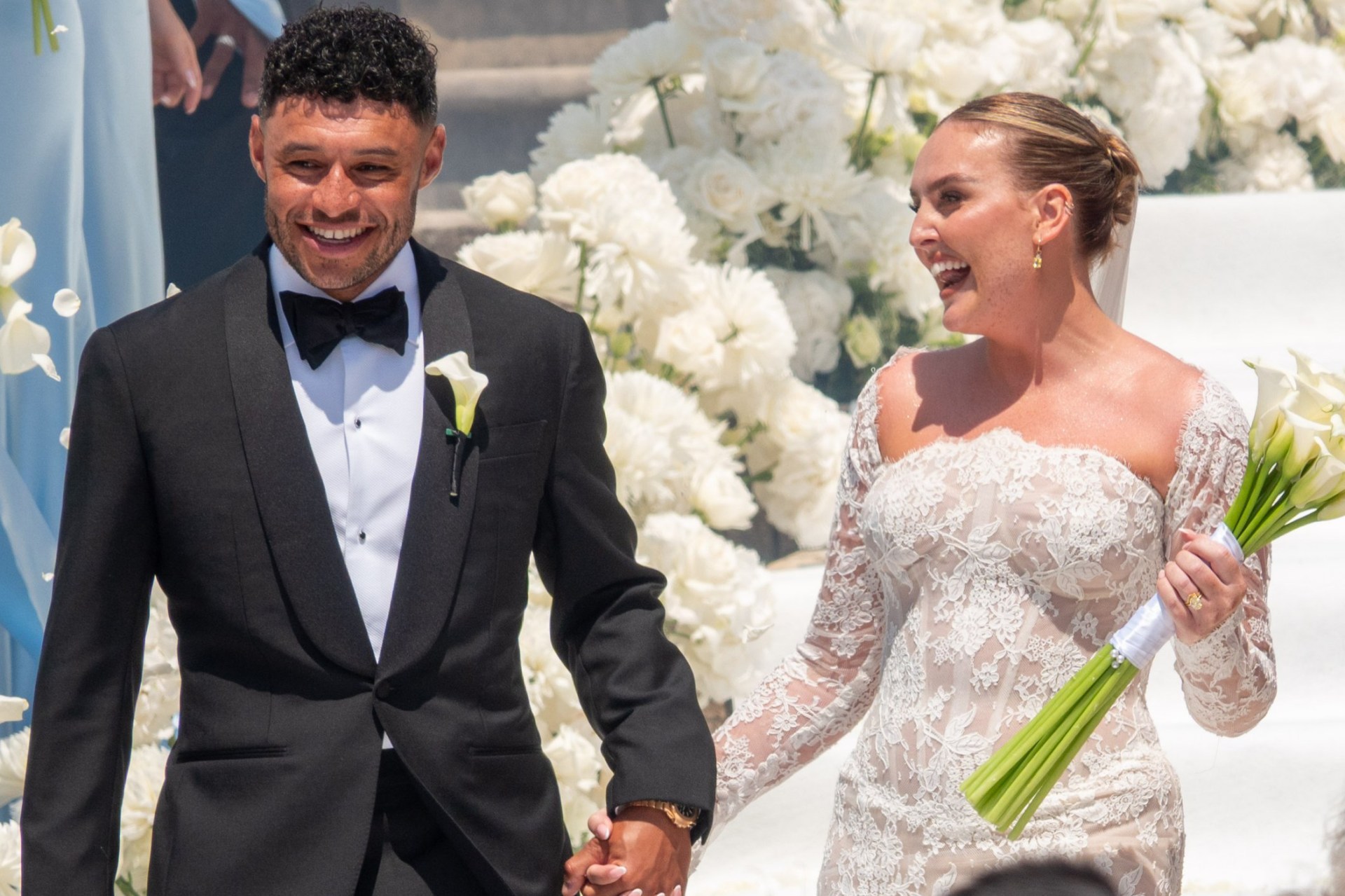 Perrie Edwards glows in lace wedding gown as she marries Alex Oxlade ...