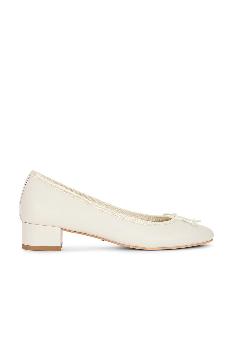 When Alexa Chung wears white shoes, she wears them with dresses like this