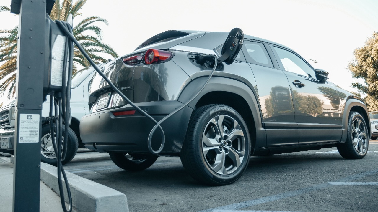An electric car can recover a little charge every time it slows down