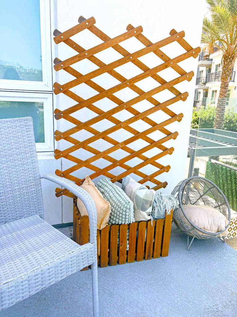 Stop using boring deck boxes - this acacia wood IKEA gem is so much better