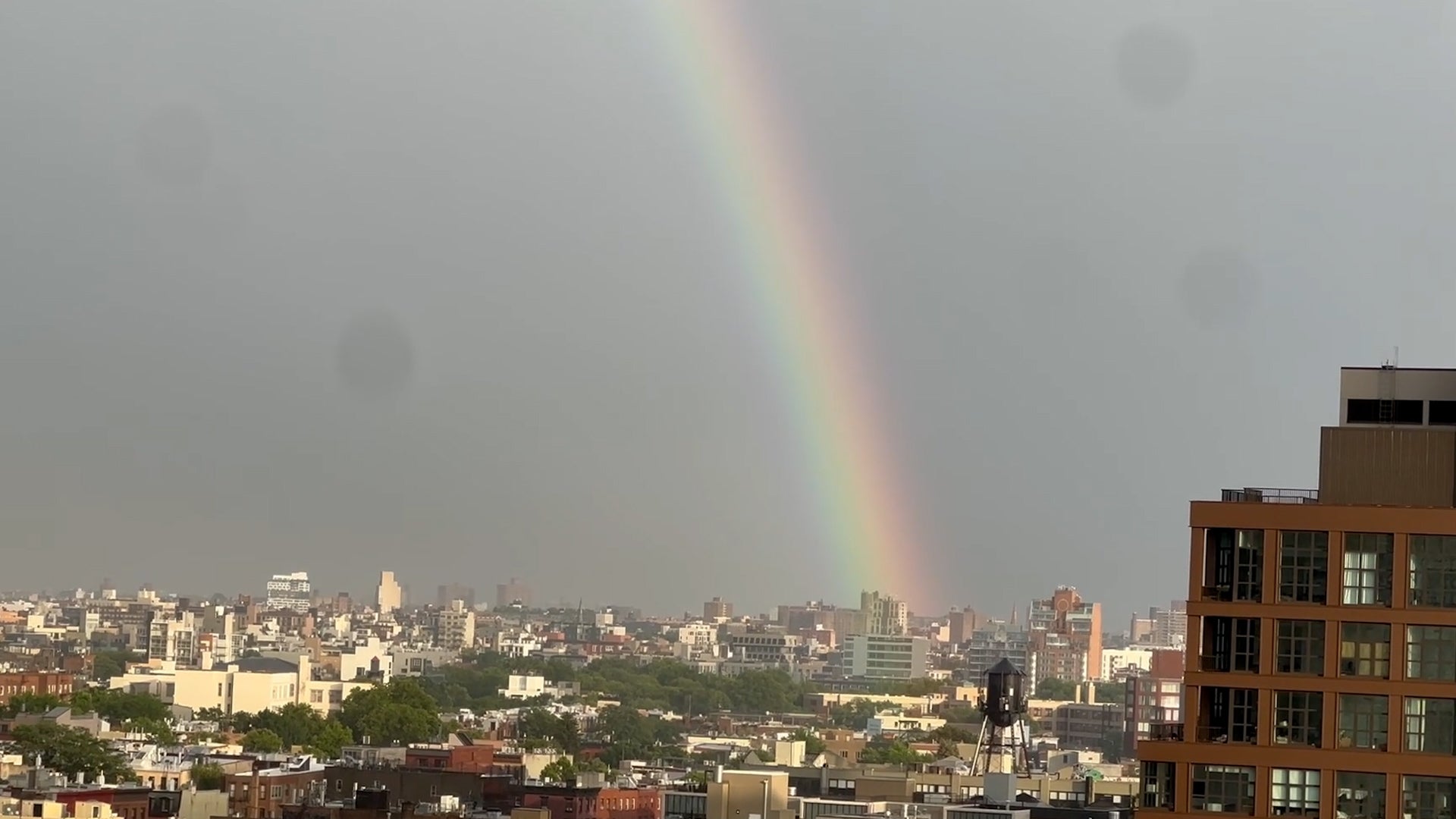 Just 30 minutes: thunderstorm to rainbow over New York City