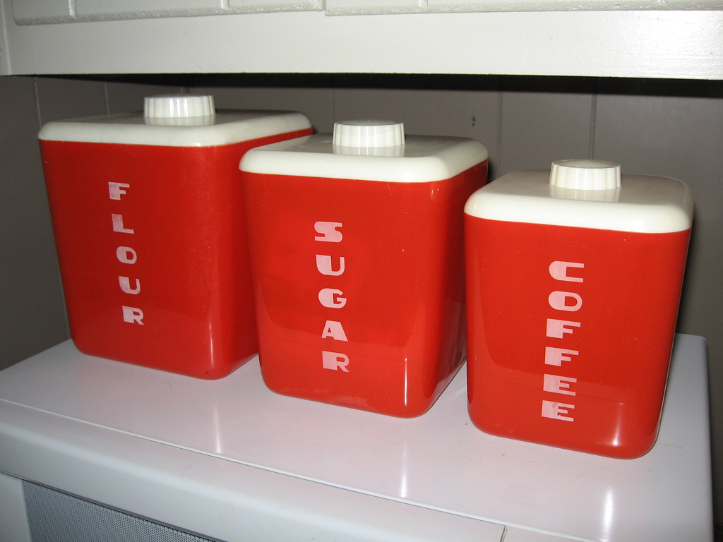Antique bread boxes and kitchen canisters from the mid-century era that ...