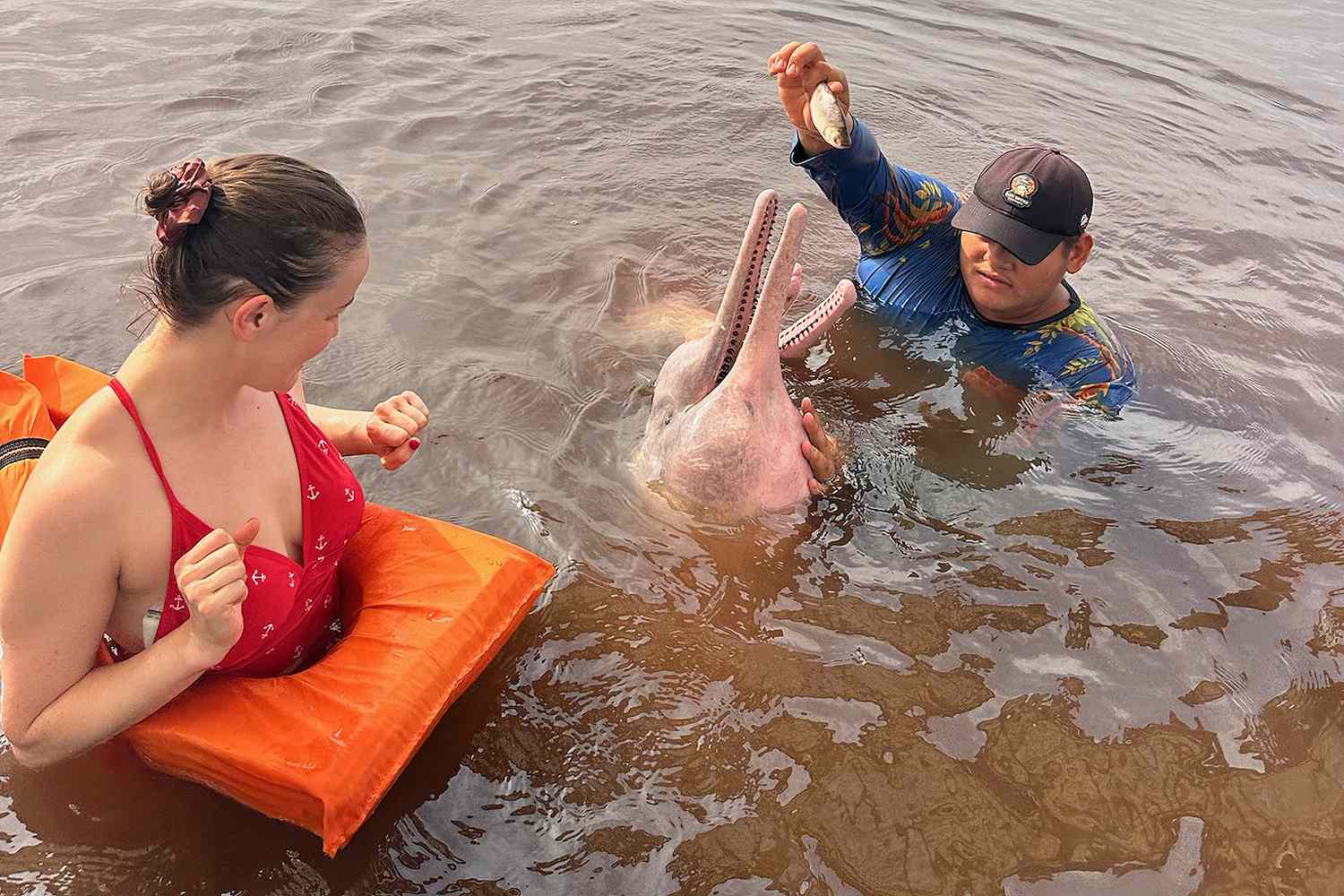 Woman thought swimming with dolphins in the Amazon would be 'cute,' but ...