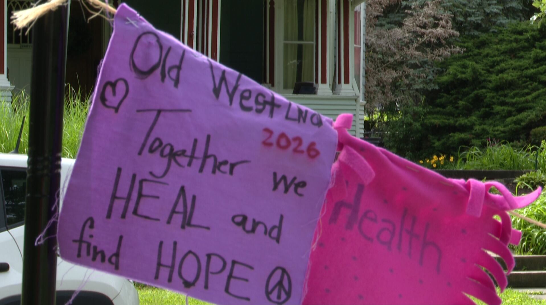 Old West End prayer flags remain up as neighbors add messages after ...