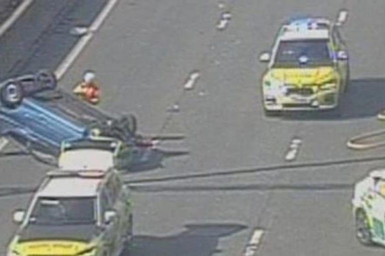 Man taken to hospital after car is flipped onto roof in dramatic M60 ...