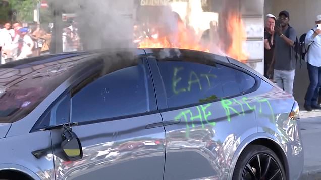 Car set alight at Geneva G7 protest