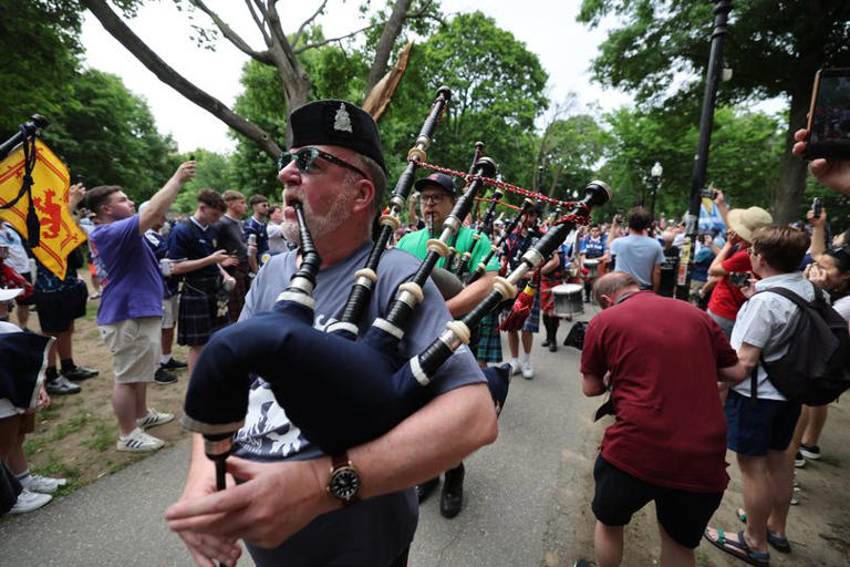 Tartan army march to Red Sox game in Boston as thousands turn out after ...