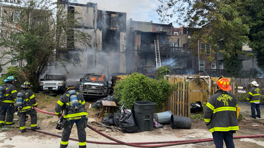 Families displaced, pets rescued after three-alarm fire in Baltimore's ...