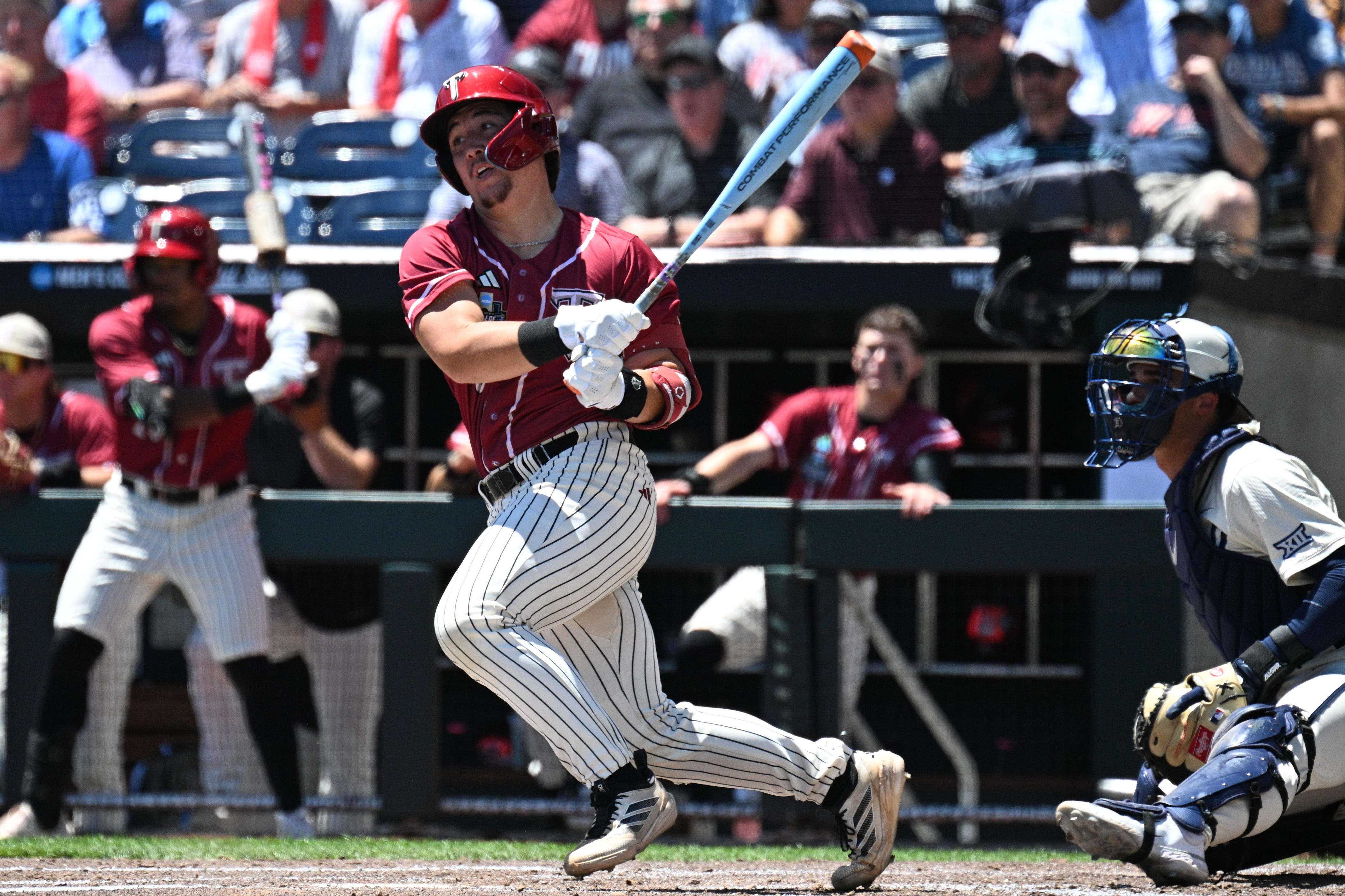Troy baseball going toe to toe with Ole Miss at CWS: Score, highlights