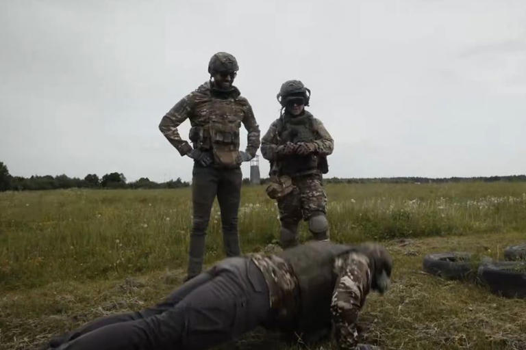 Andrew Tate joins Putin's army during mad propaganda trip to promote Russia