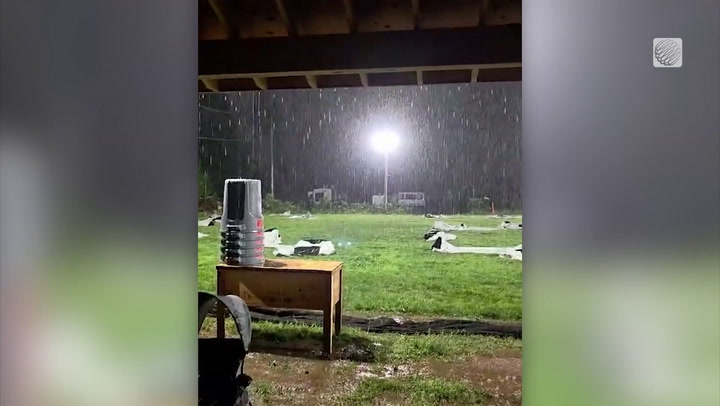 Severe downpour caught on camera at paintball field