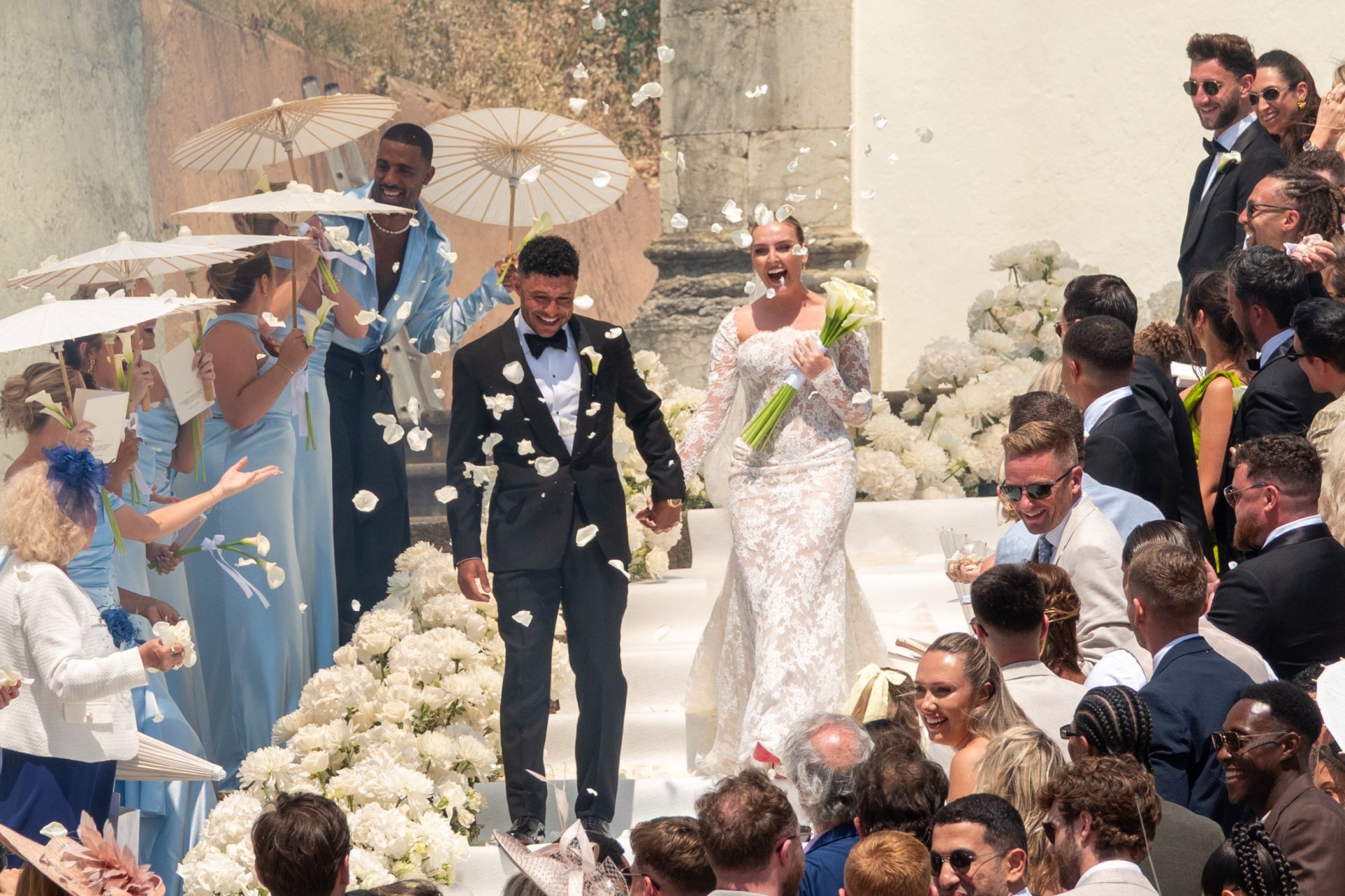 Perrie Edwards glows in lace wedding gown as she marries Alex Oxlade ...