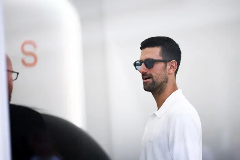 Djokovic waves checkered flag for Hamilton's first Ferrari win in ...