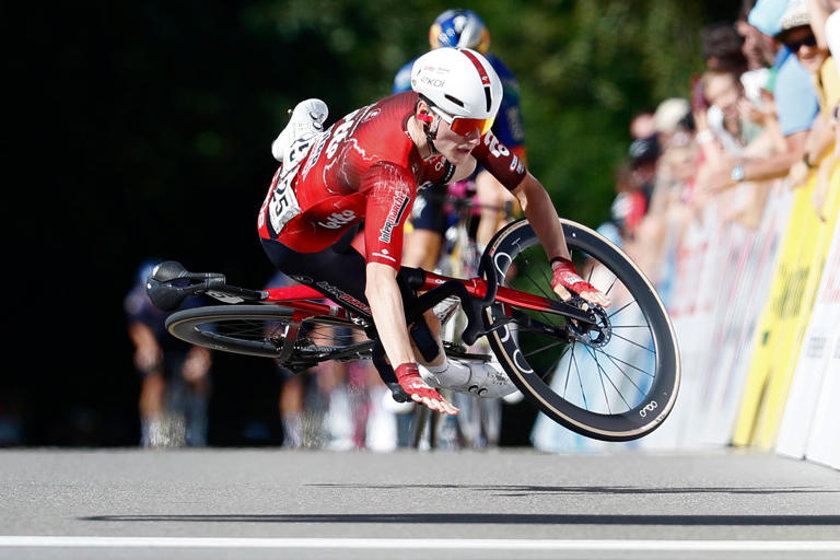 New way to win a bike race: Celebrate early, crash, slide across line