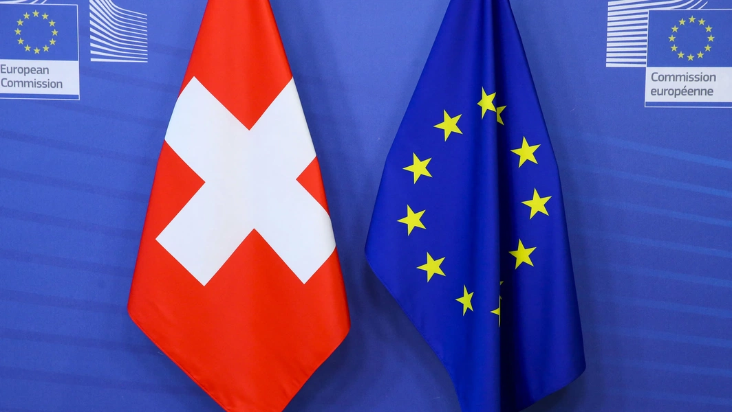 Swiss voters reject population cap to safeguard EU ties