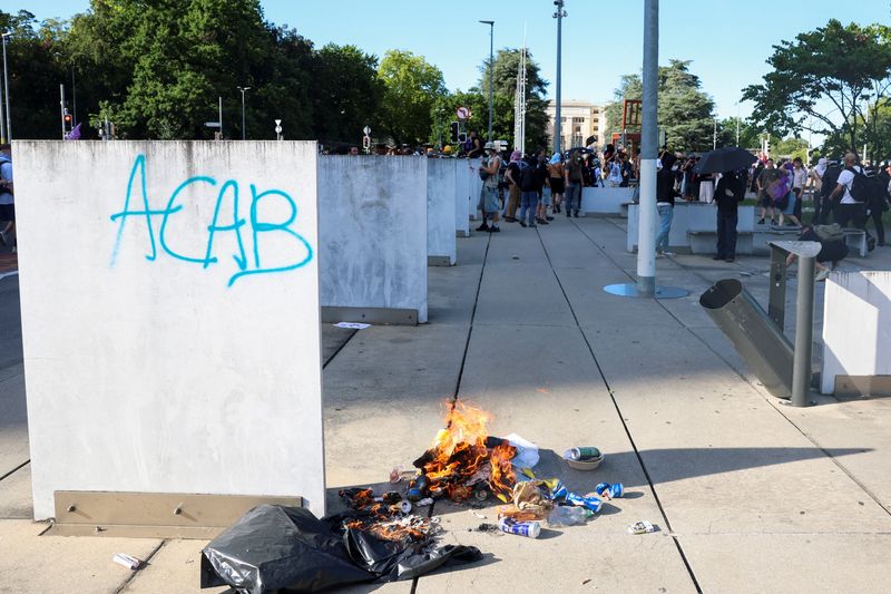 Swiss police fire tear gas as anti-G7 protesters target UN site
