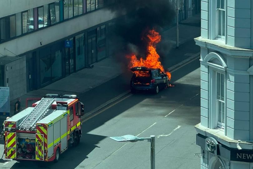 'Explosions' heard as taxi goes up in flames outside Plymouth hotel