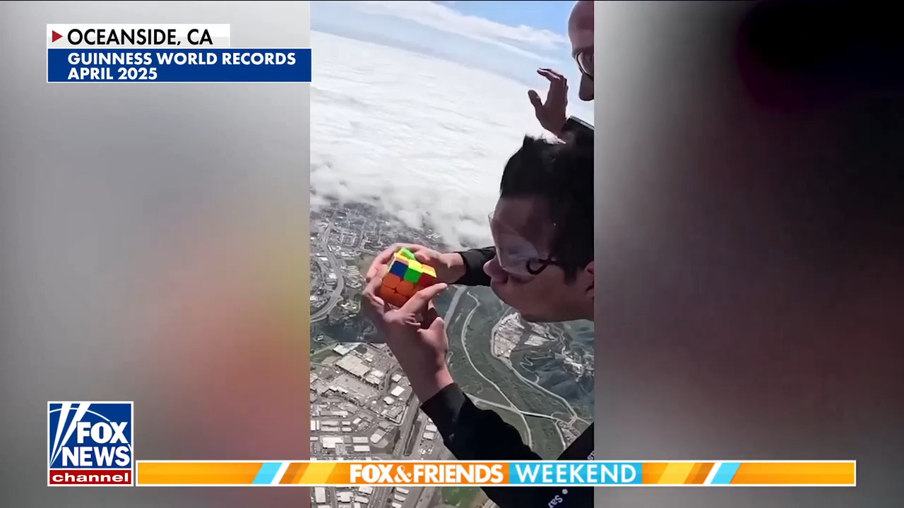 Man breaks world record after solving 2 Rubik's cubes while skydiving