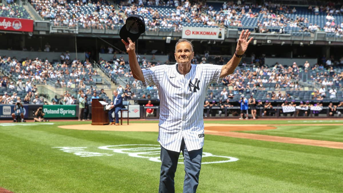 Titles give Mike Brown and Joe Torre rare feat
