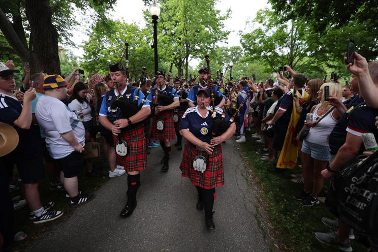 Tartan army march to Red Sox game in Boston as thousands turn out after ...