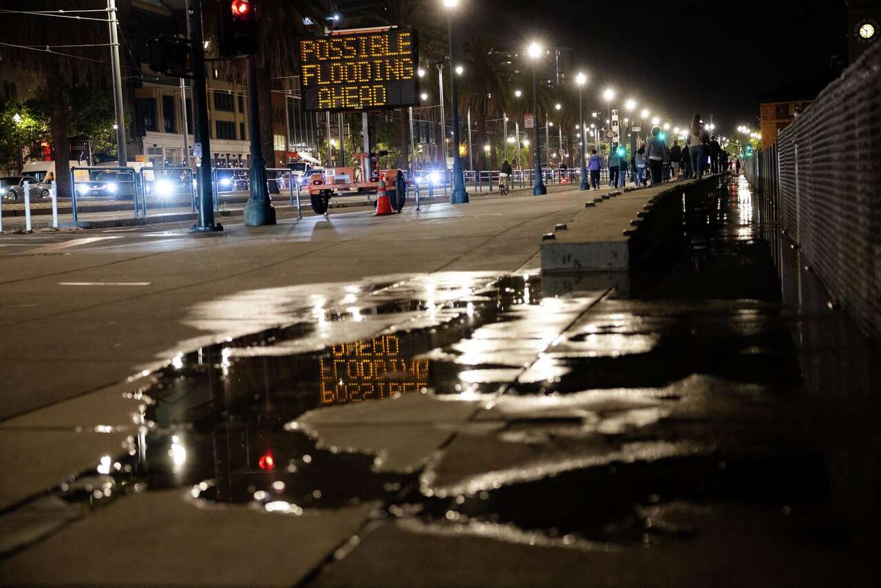Sea water floods SF.'s Embarcadero amid predictions of record summer tides