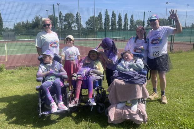 Over 100 people take part in colour dash raising thousands for ...