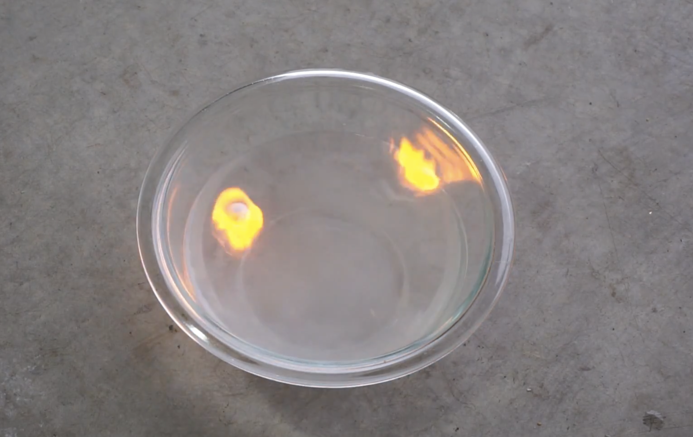 Don't spray sodium metal with water after flattening it in a hydraulic ...