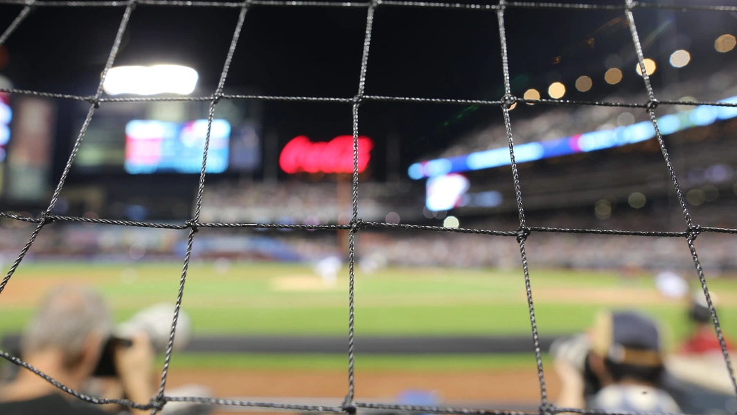 Yastrzemski's throw hits net pole in unusual MLB play