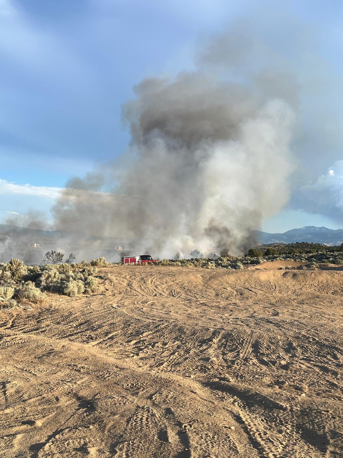 TMFPD: Forward progress stopped on brush fire west of Sun Valley