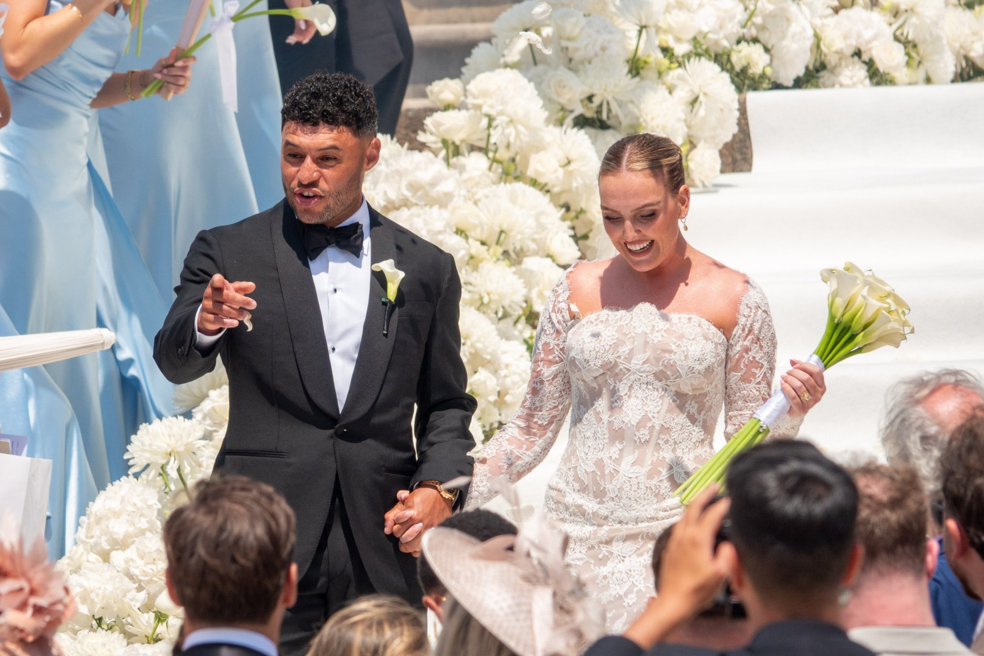 Perrie Edwards glows in lace wedding gown as she marries Alex Oxlade ...