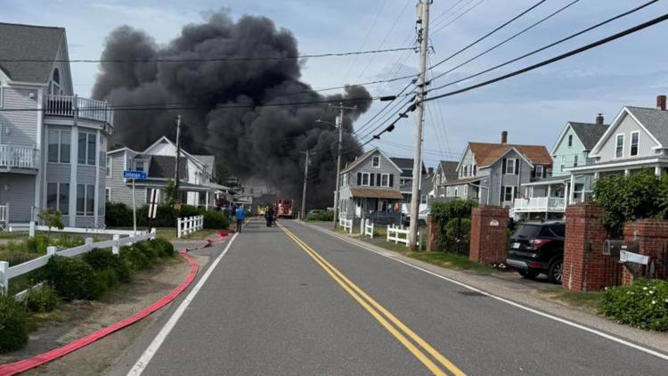 Video shows large structure fire, thick black smoke in Wells