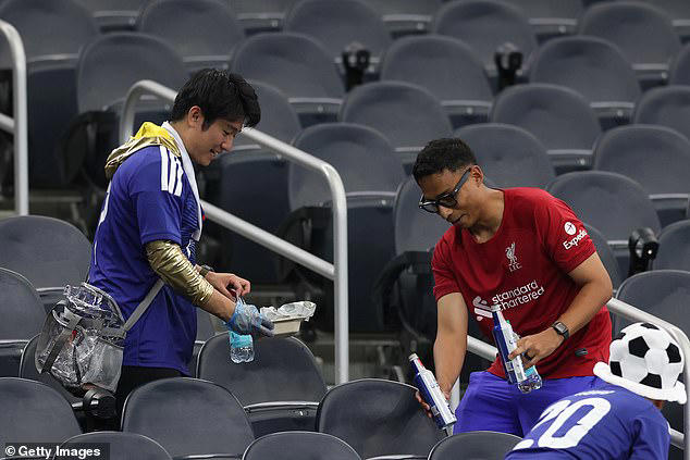 Classy Japan fans clean up after themselves following draw against the ...