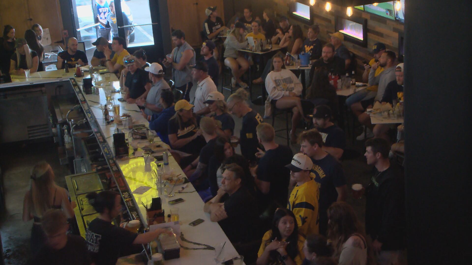 WVU baseball fans head to the GOAT West Virginia Pub for College World ...