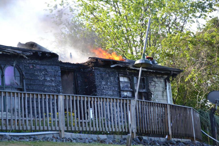 Officials investigating structure fire in Westport