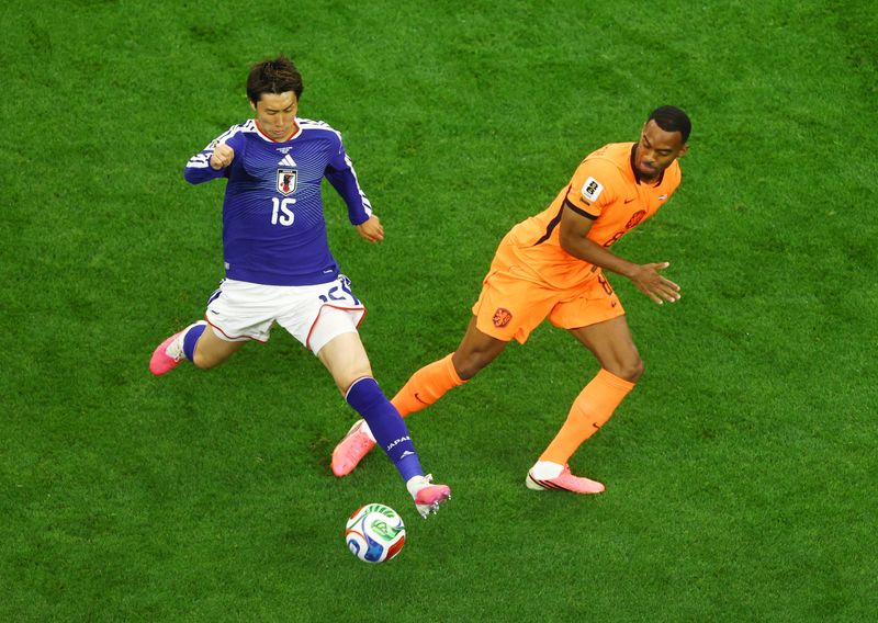 Soccer-Japan battle back to draw 2-2 with Netherlands in Texas thriller