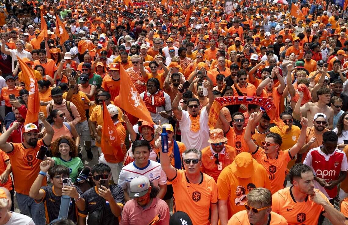 Netherlands soccer fans bring sea of orange to Dallas Stadium during ...