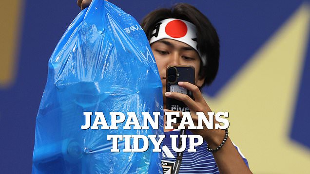 Japan fans clean up after themselves after Netherlands match