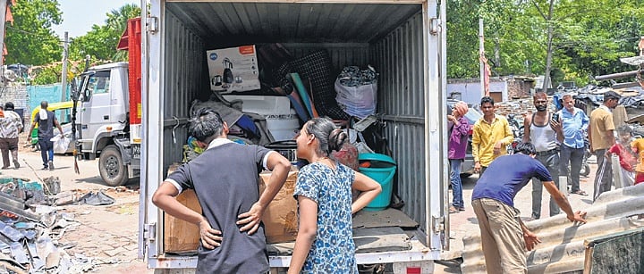 Slum clusters near PM residence razed