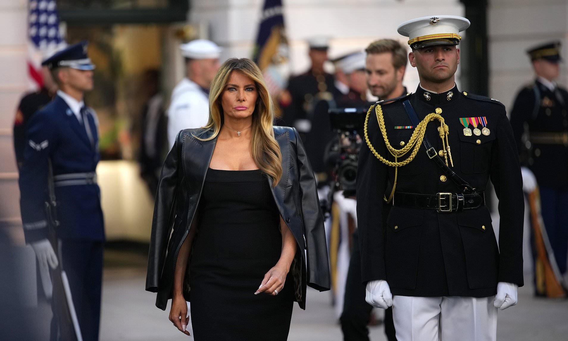 Melania stuns in black at White House UFC event as dark clouds gather ...