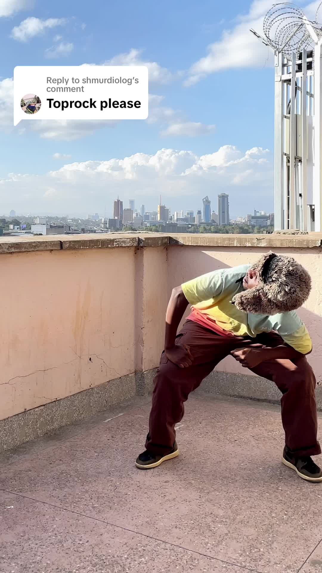 Top rock dance moves on a rooftop session