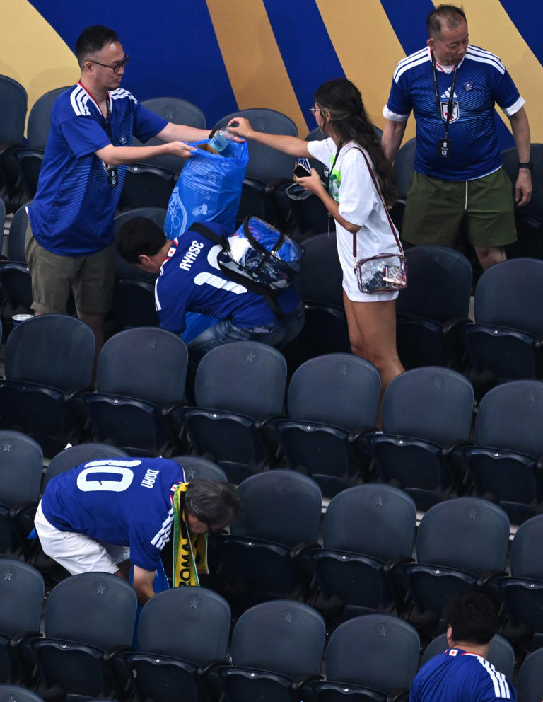 It's our way: Japan fans win hearts by cleaning up after World Cup match